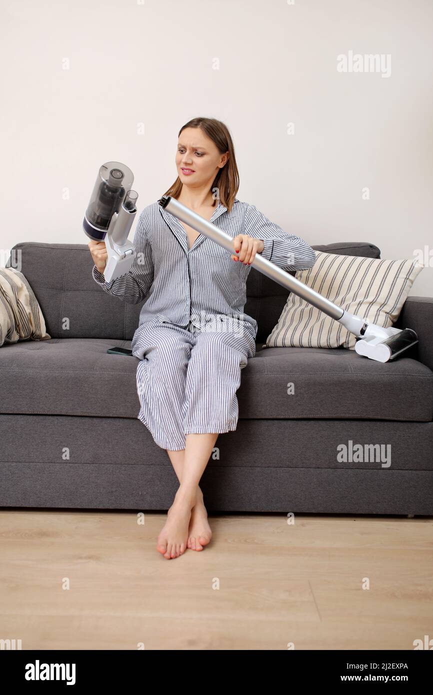 Asian woman vacuuming hi-res stock photography and images - Alamy