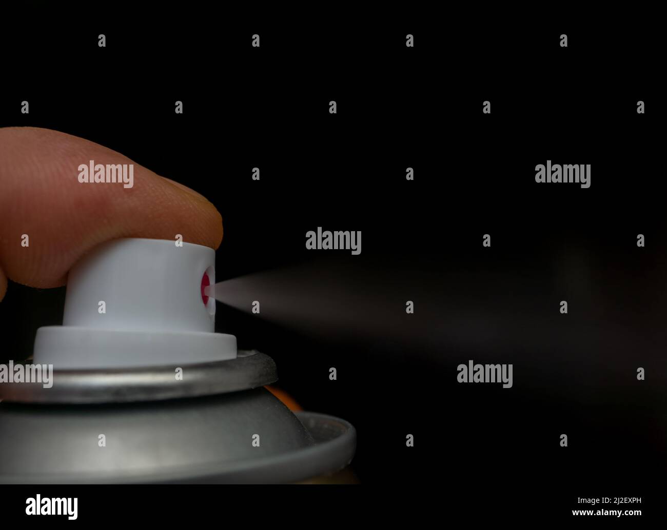 finger pressing a spray can with white background and copy space Stock ...