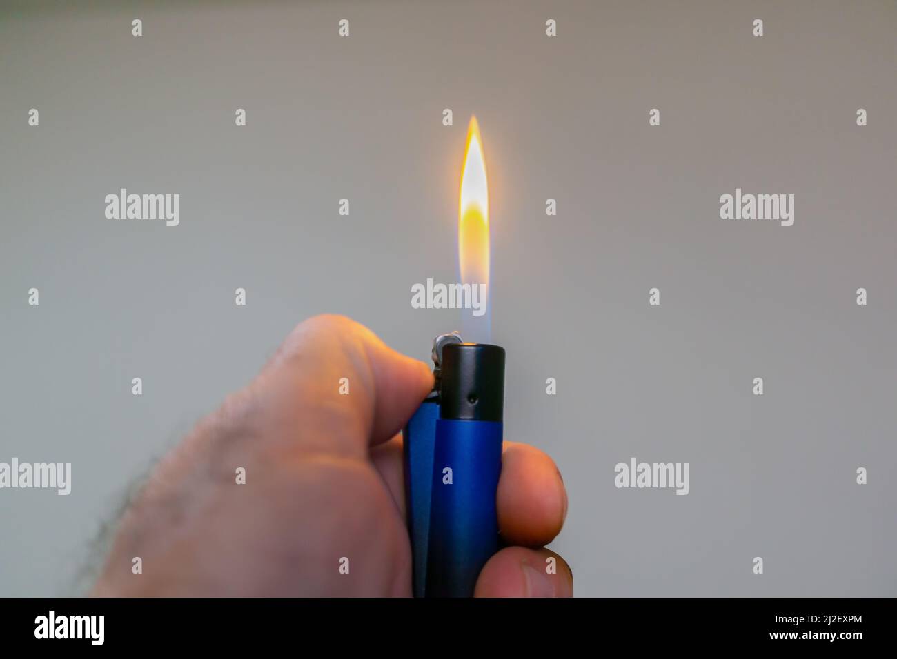 Thumb on lighter hi-res stock photography and images - Alamy