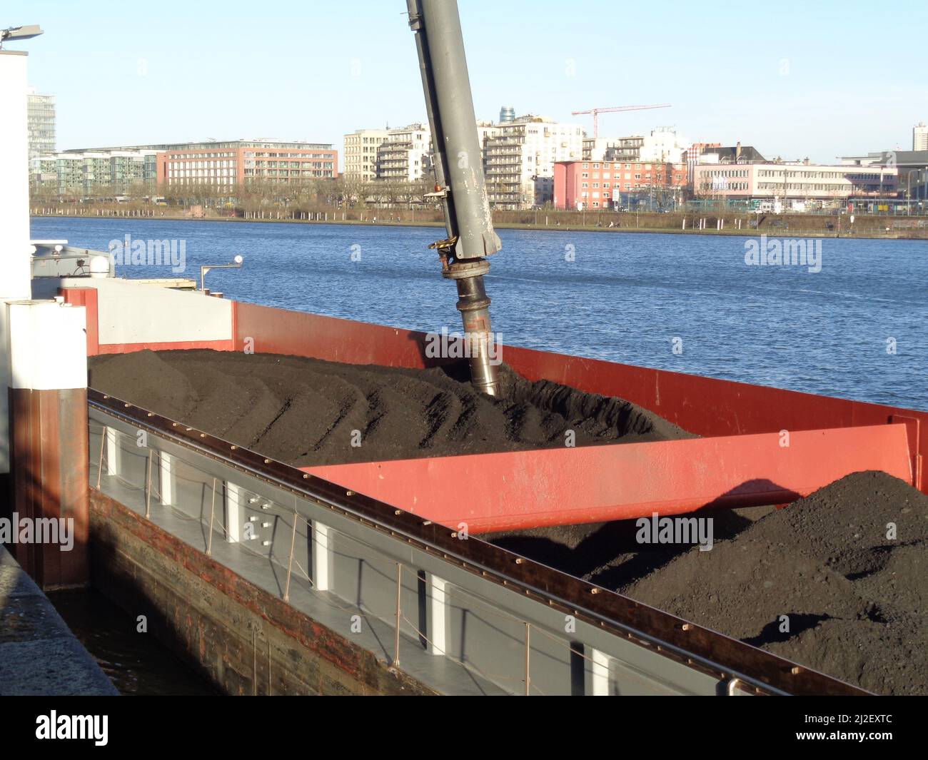 Unloading hard coal at the West CHP plant in Frankfurt, Germany from a ...