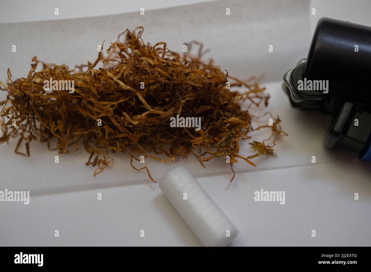 rolling tobacco, filter and lighter objects for rolling a cigarette ... rolling tobacco, filter and lighter objects for rolling a cigarette ...