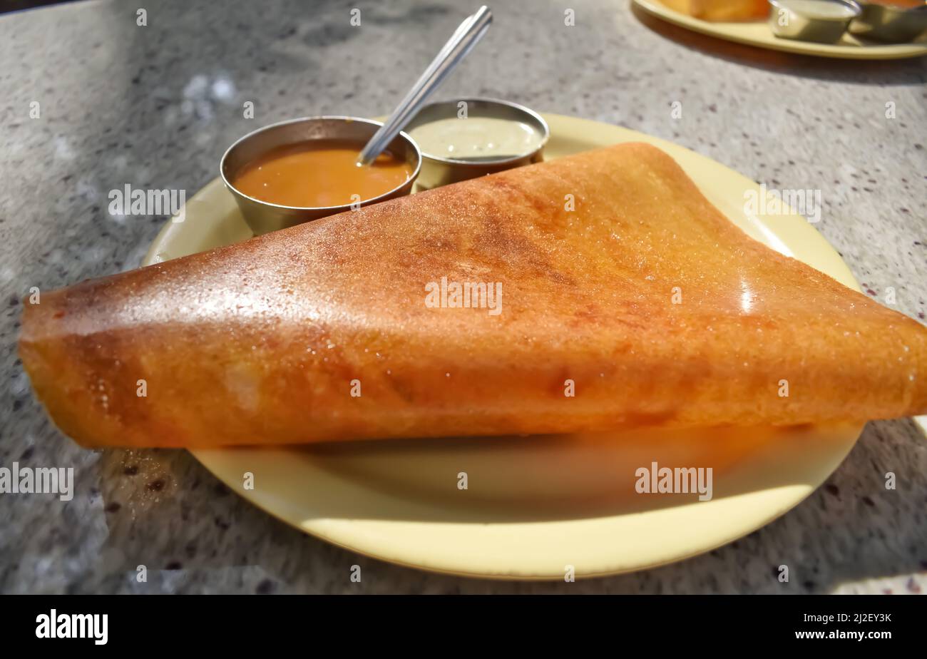 Selective focus Picture of a Freshly made Roosted Masala Dosa on the ...