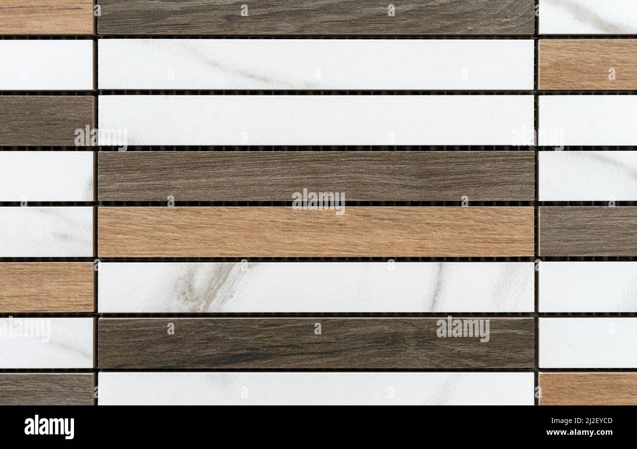 Ceramic tiles in the form of rectangles with wood color and texture ...