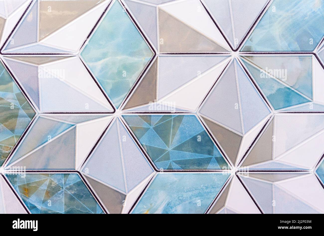 White-turquoise ceramic tile with 3D rhombus pattern. Tile background ...