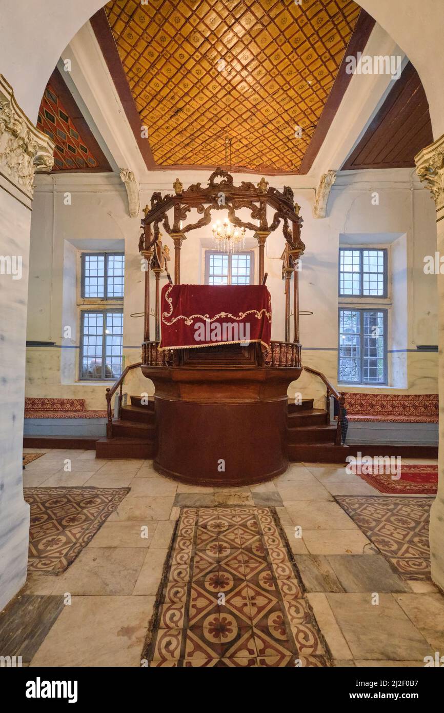 Interior with benches and the wood, circular, round bima. At the Shalom ...