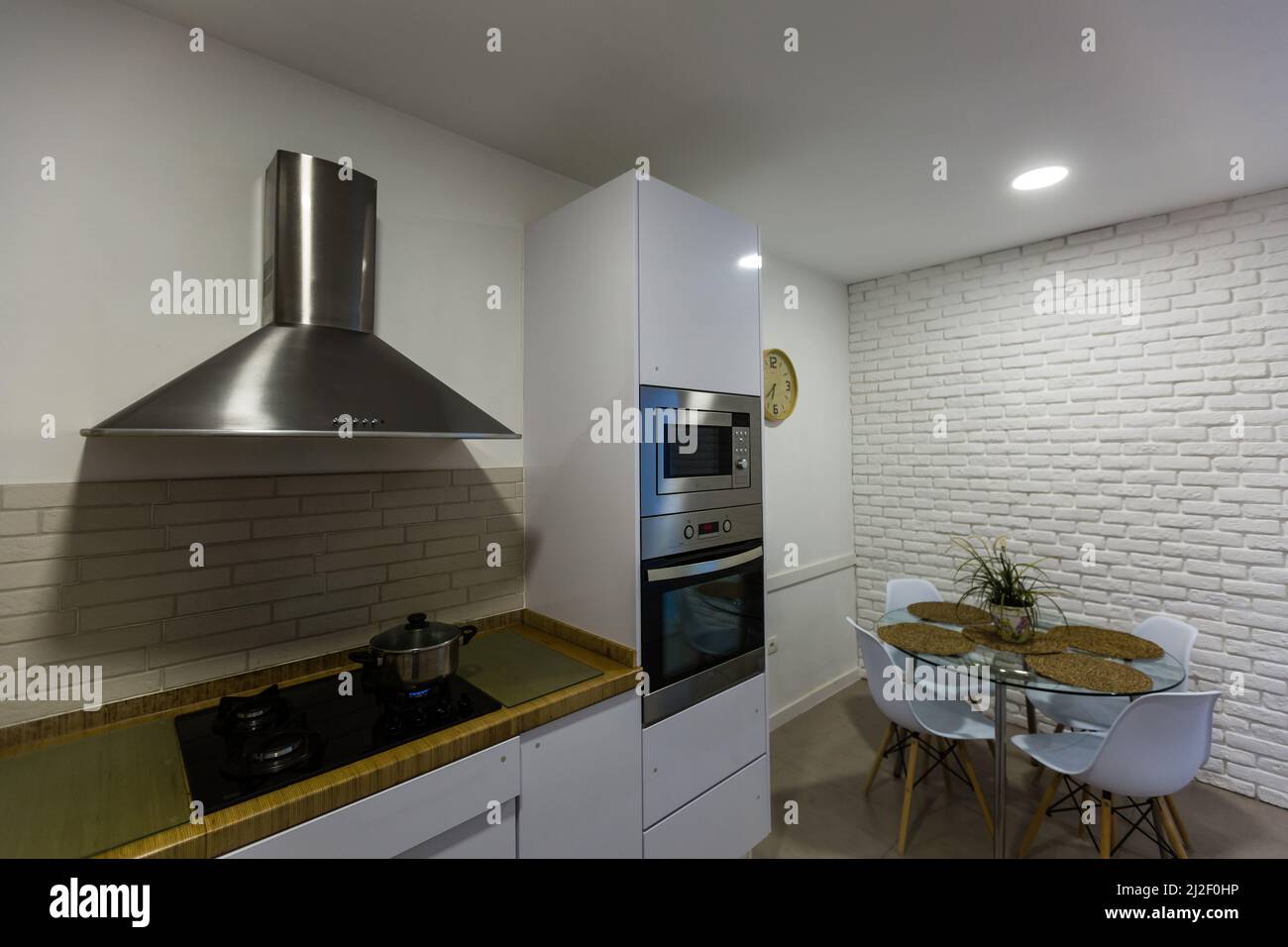 Modern white kitchen clean interior design Stock Photo - Alamy