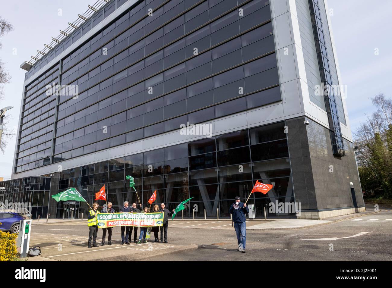 RMT Regional Organiser Mick Hogg (right), speaks outside Glasgow Queen ...
