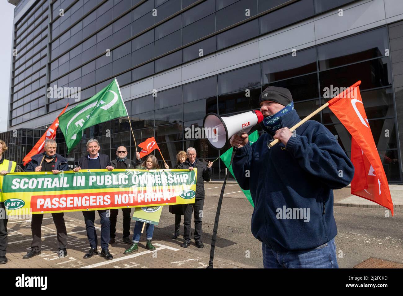 RMT Regional Organiser Mick Hogg (right), speaks outside Glasgow Queen ...