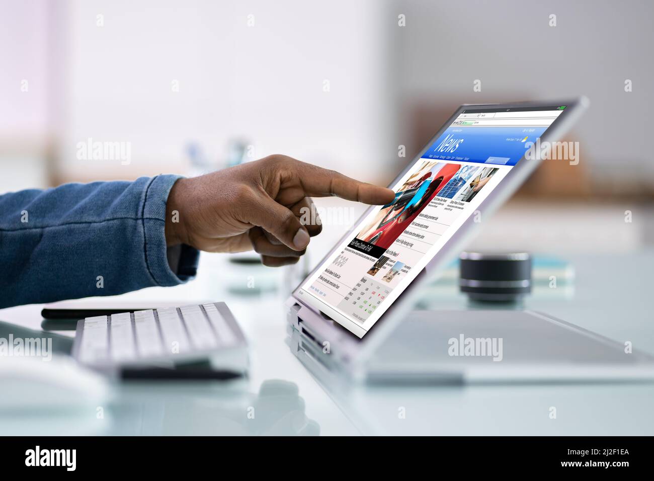 Reading Online News Media. Looking At Newspaper On Screen Stock Photo ...