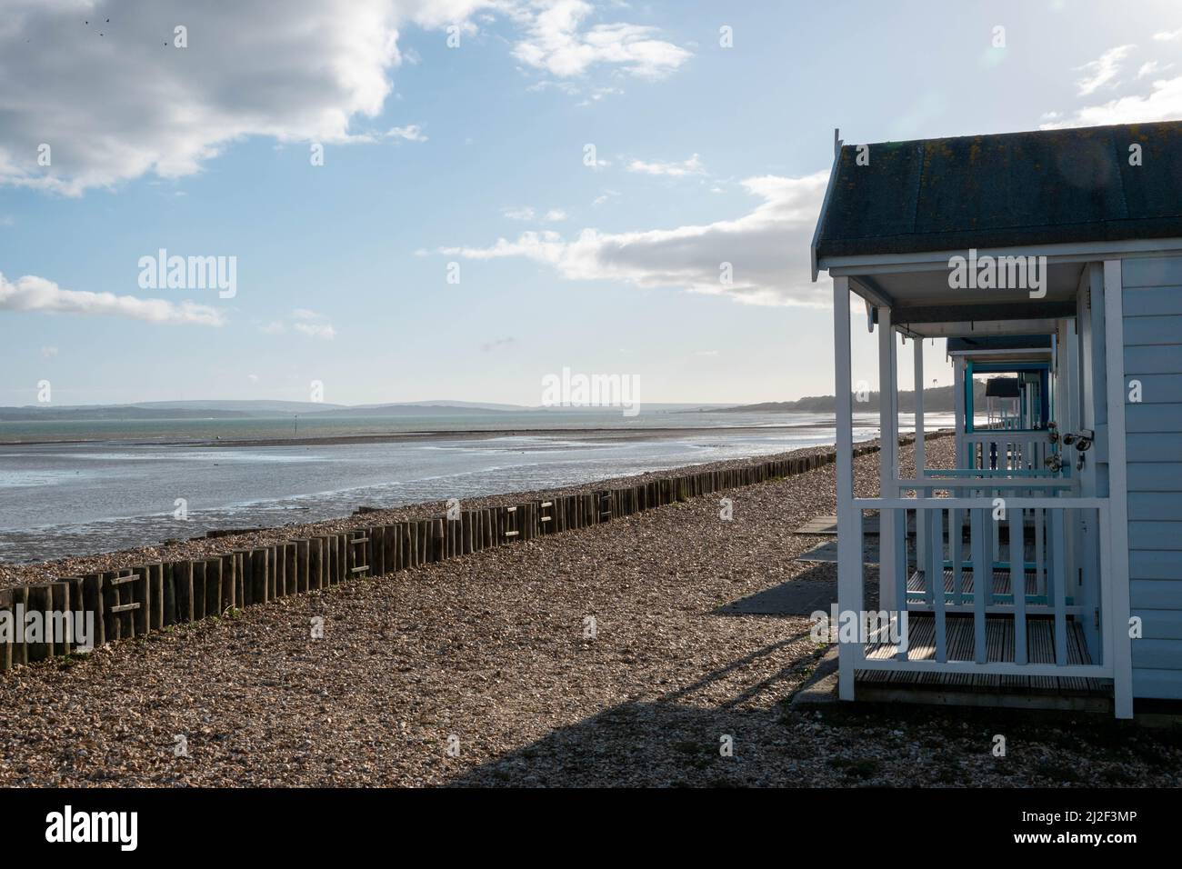 beach huts along the shore at Calshot England Hampshire Stock Photo - Alamy