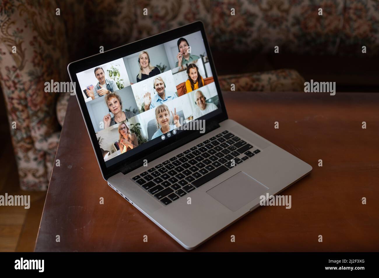 Video Conferencing Call Waving Hello With Hand Stock Photo - Alamy