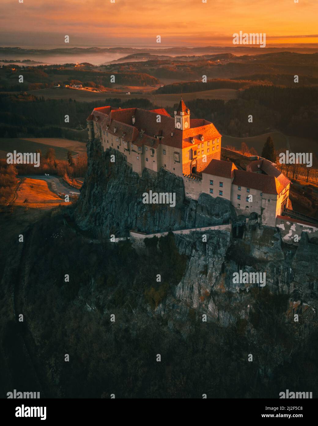 Aerial panorama view of historic old medieval castle Riegersburg on ...