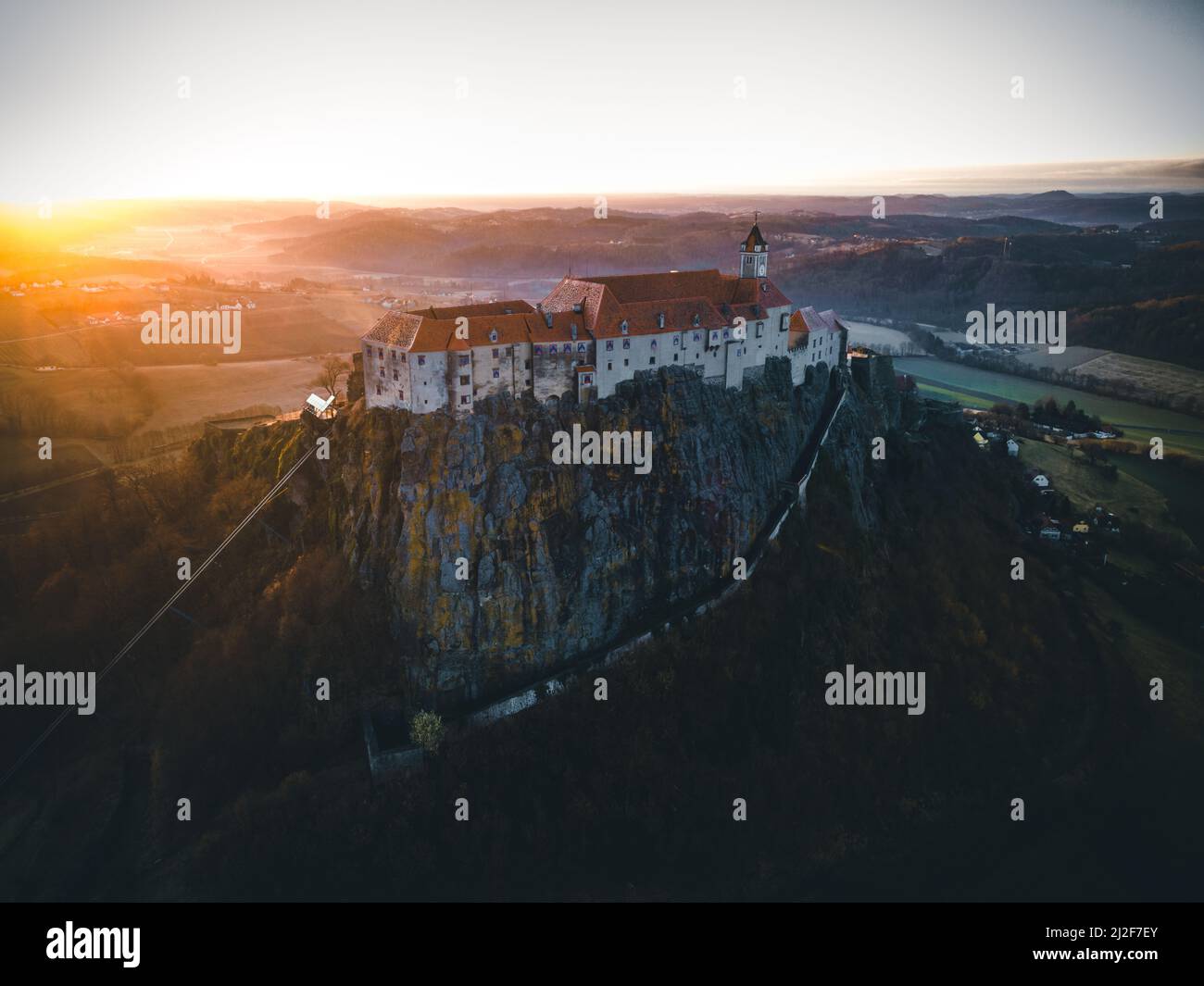 Aerial panorama view of historic old medieval castle Riegersburg on ...