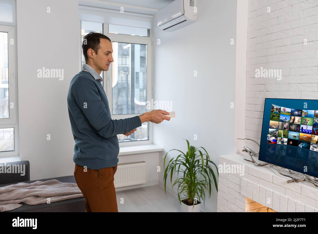 Weekend leisure activities. Millennial Caucasian man with remote ...