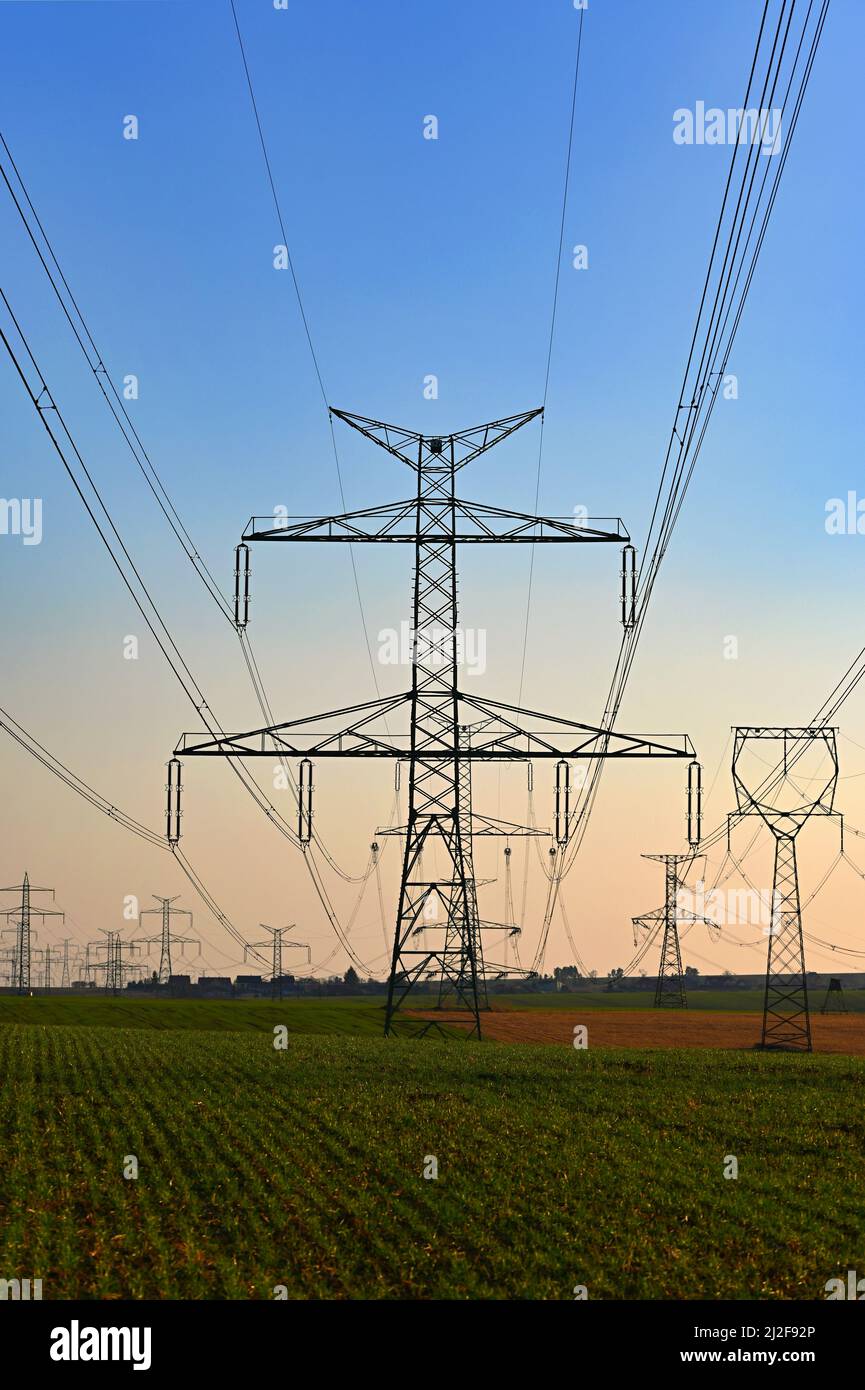 High voltage pylons. Concept for technology and industry. Rising energy ...