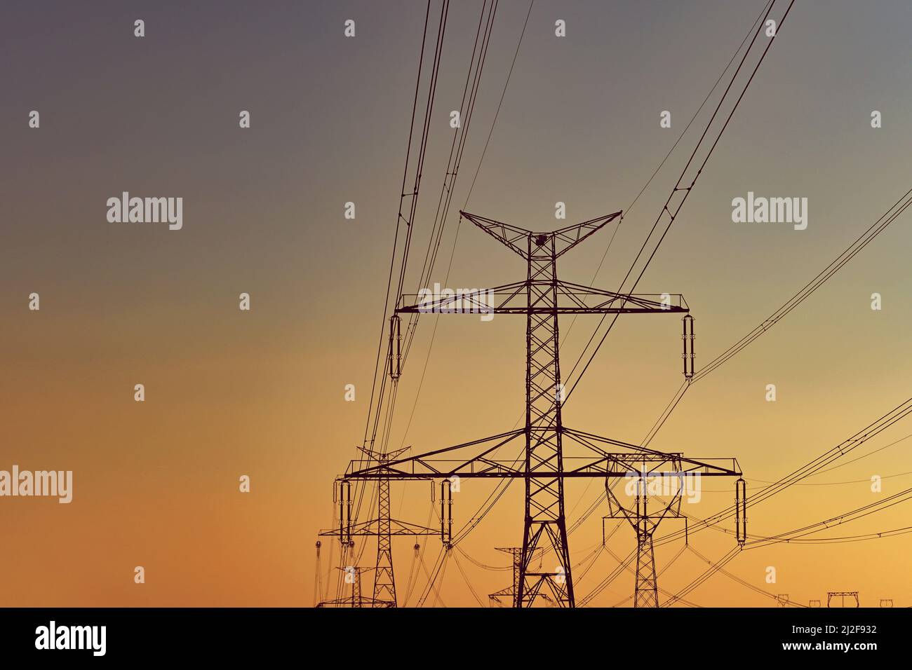 High voltage pylons. Concept for technology and industry. Rising energy ...