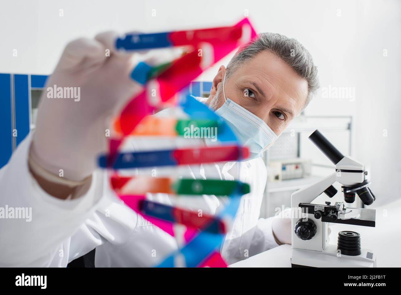 Dna model microscope hi-res stock photography and images - Alamy