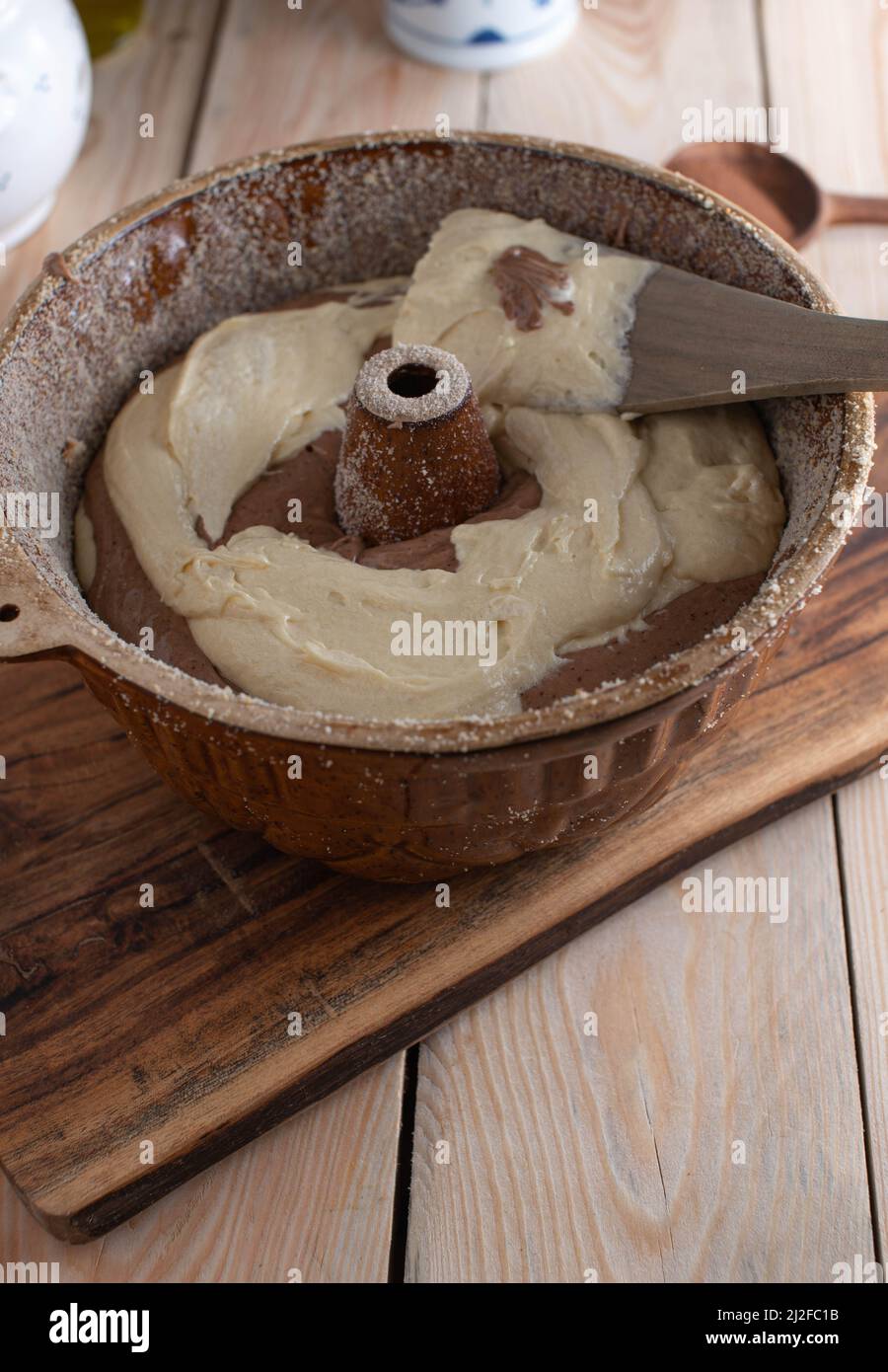 Cake batter in a bundt cake pan Stock Photo - Alamy