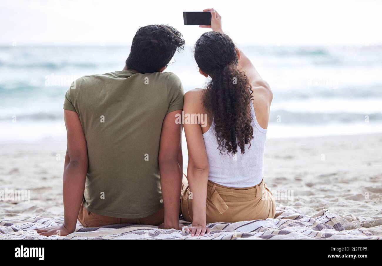 We Know All The Good Angles Shot Of A Young Couple Taking A Selfie At
