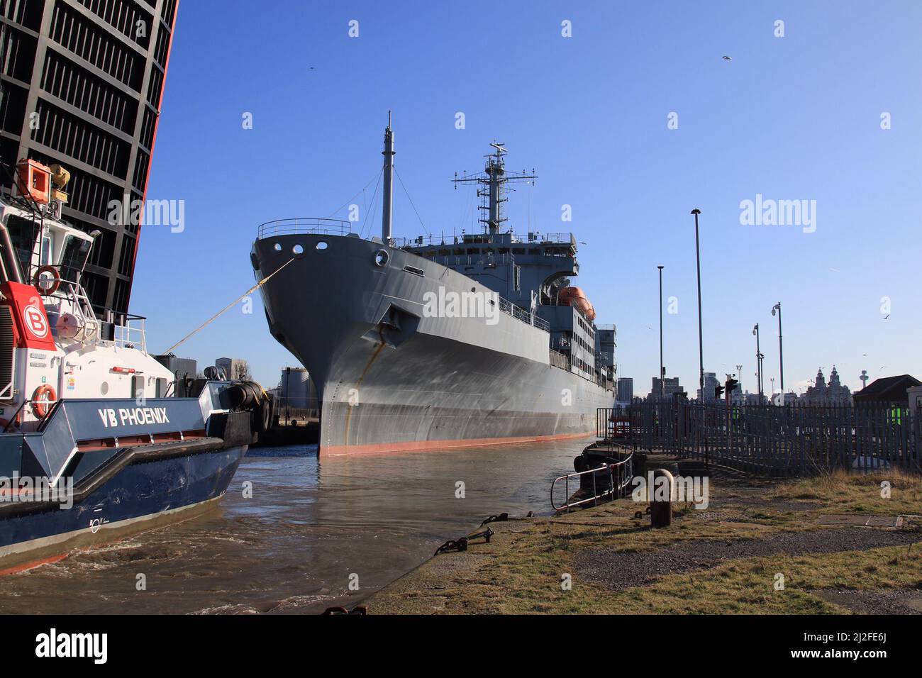 Ex RFA Fort Austin leaving Birkenhead docks onto Cammel lairds Stock ...