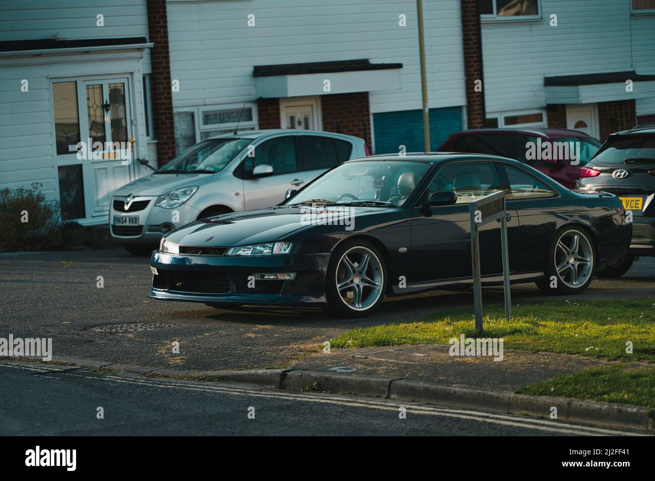 The vertical shot of a Nissan s15 car parked on a street side Stock ...