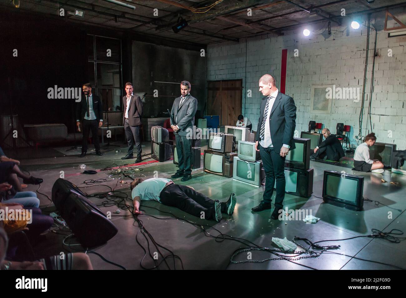 Large group of theater actor artists on stage perform play for audience ...