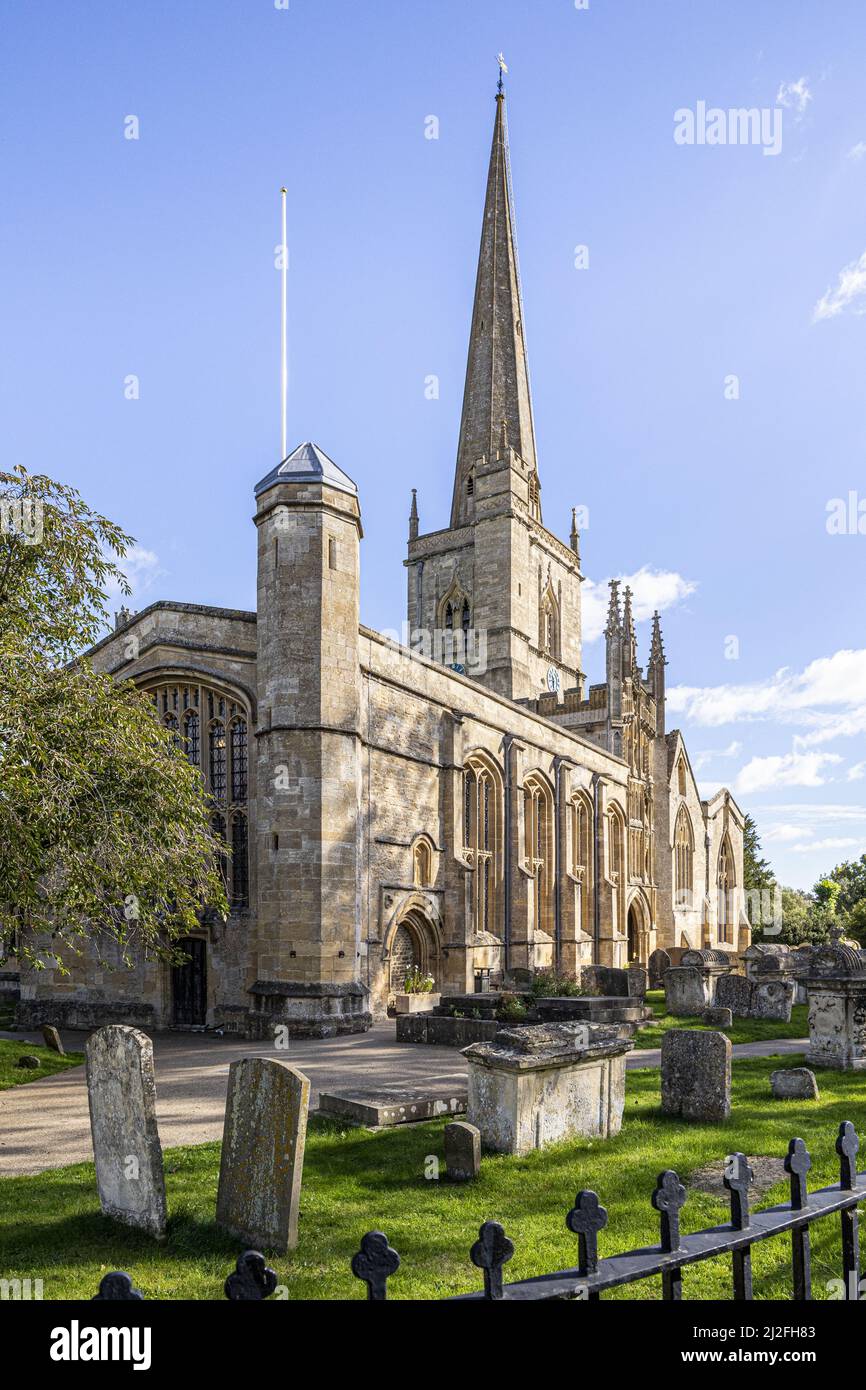 The parish church of St John the Baptist in the Cotswold town of ...