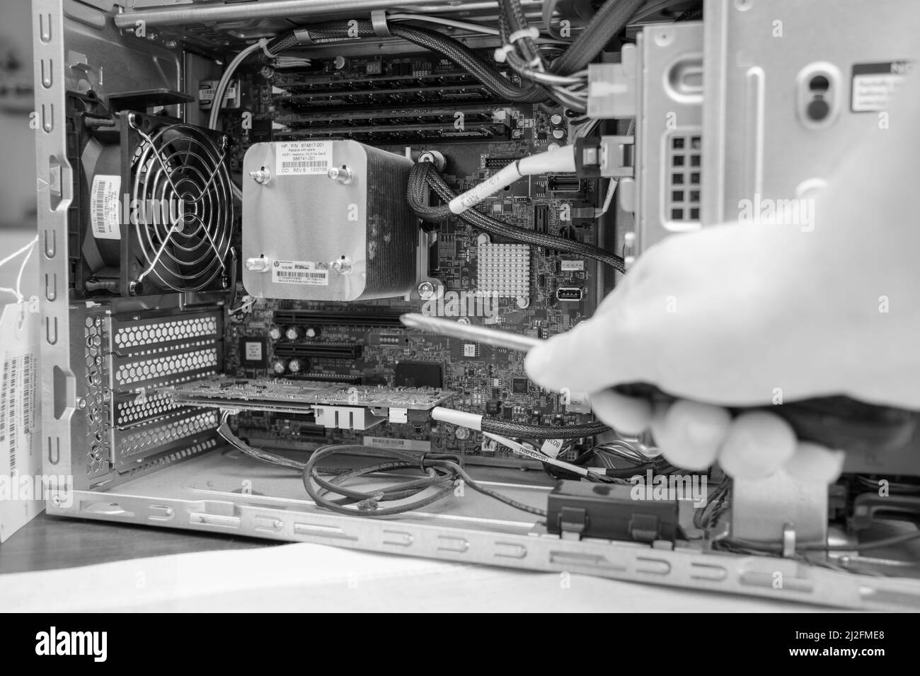 Screwdriver in hand Black and White Stock Photos & Images - Alamy