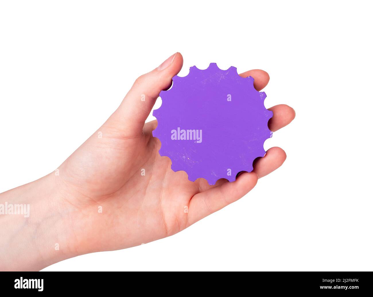 Settings concept. Woman hand with gear isolated on white background ...