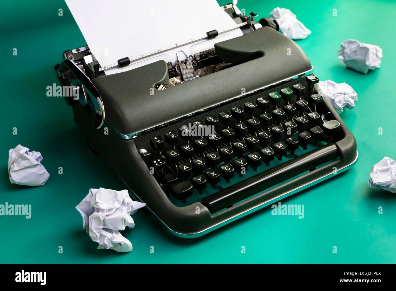 Vintage typewriter and crumpled paper sheets. Writer and blogger ...