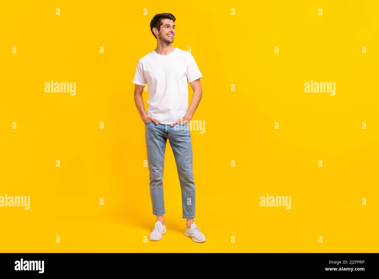 Full body photo of cute young brunet guy stand look ad wear eyewear t ...