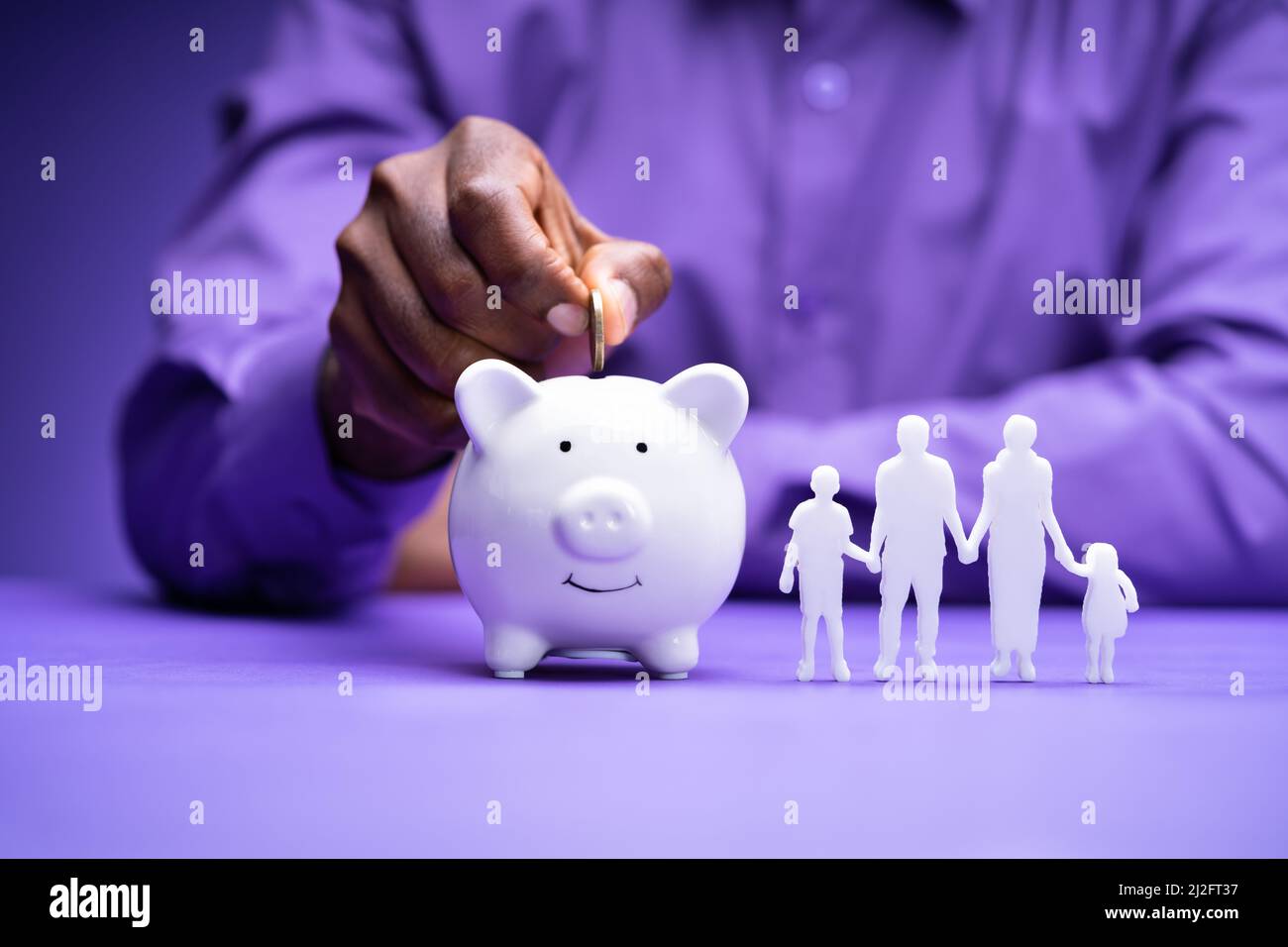 African American Saving Money For Family Security Stock Photo - Alamy