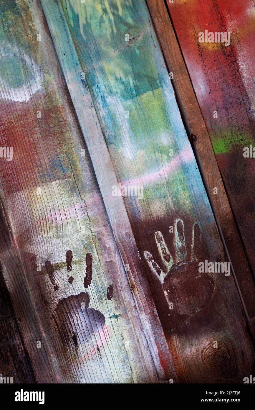 Handprints on a painted wooden wall Stock Photo - Alamy