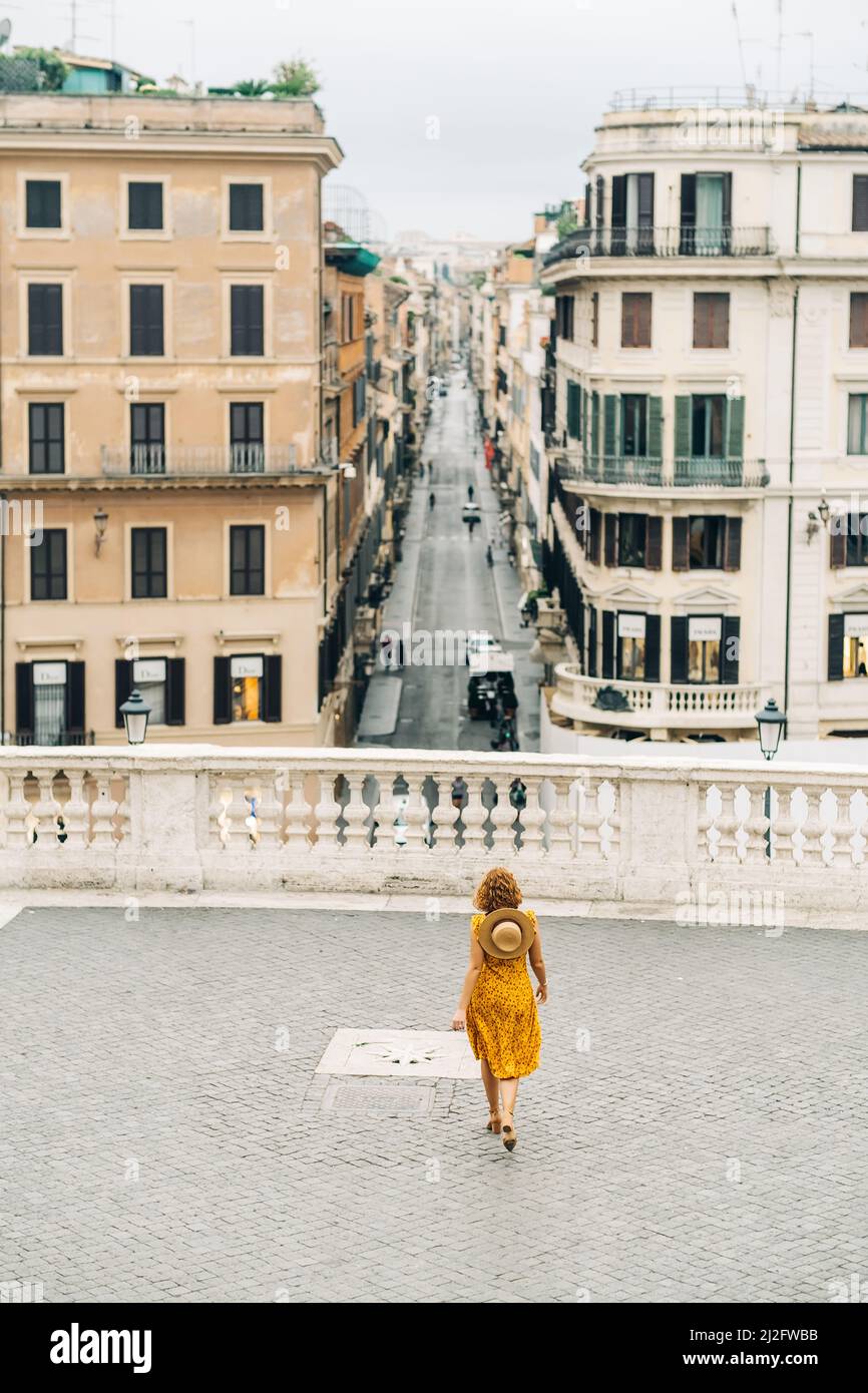 Rome Italia travel summer tourism concept. A tanned young woman walks ...
