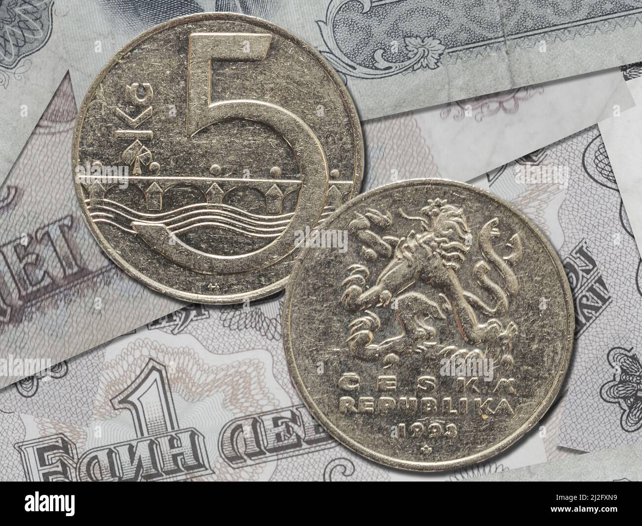 The Czech koruna coin isolated on paper money background Stock Photo ...