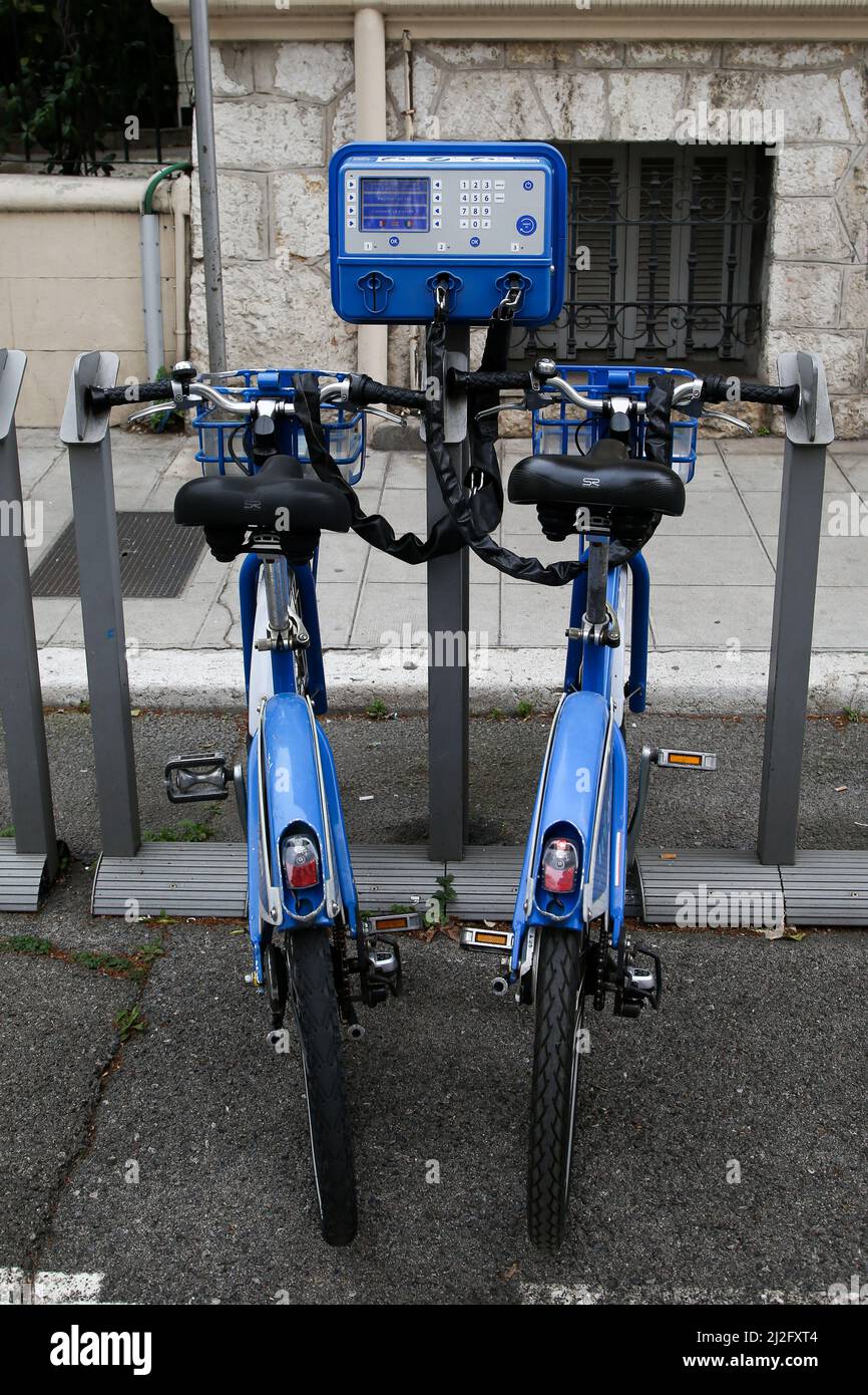 Electric bikes parked at a docking station. E-V lobleu is the rental ...
