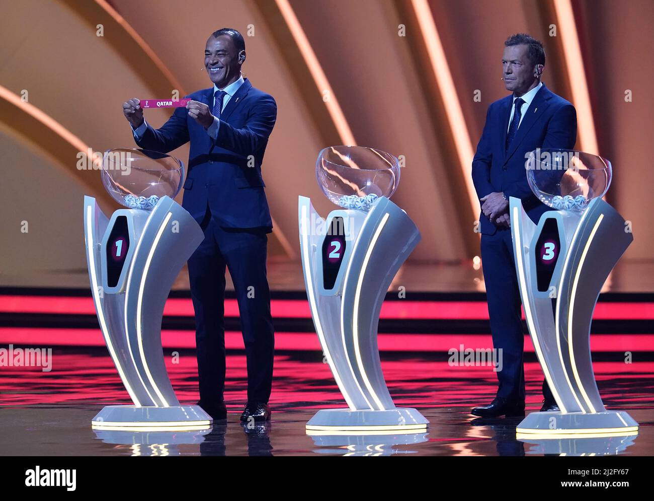 Cafu holds up Qatar after drawing them out of Pot 1 during the FIFA ...