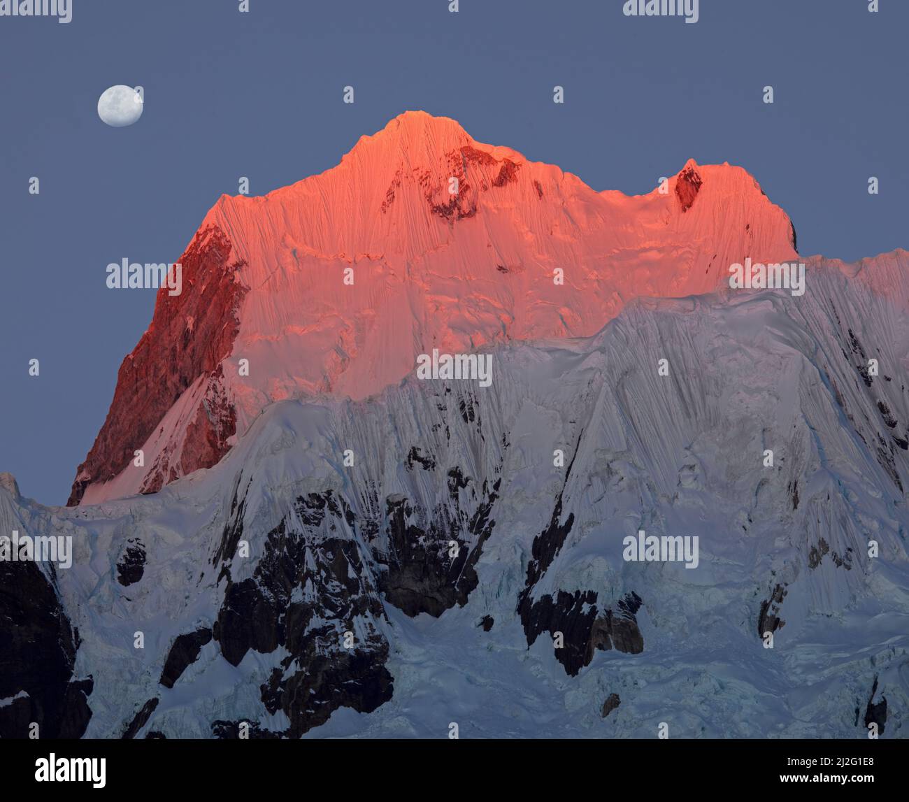 Sunset on Nevado Yerupaja, highest peak in the Cordillera Huayhuash ...