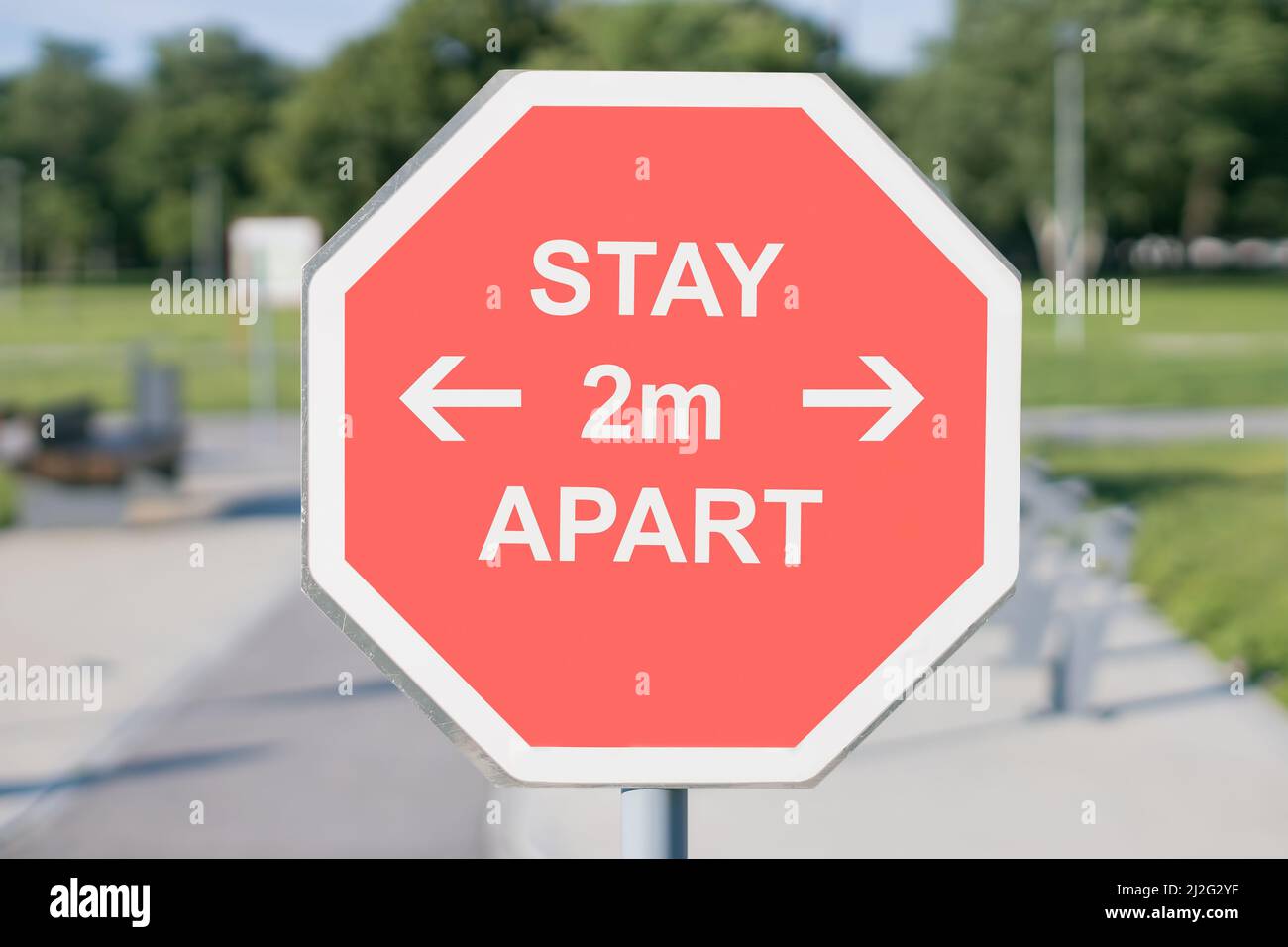 stay two meters apart outdoor sign Stock Photo - Alamy