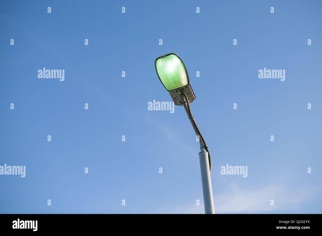 street light bulb with blue sky background Stock Photo - Alamy