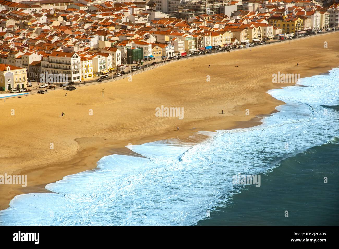 Aerial view of Nazare town and big waves, Atlantic Ocean, Portugal ...