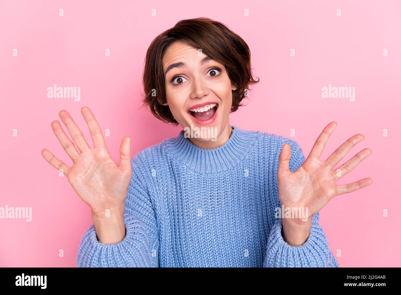 Portrait of funny positive lady hands palms demonstrate number ten open ...