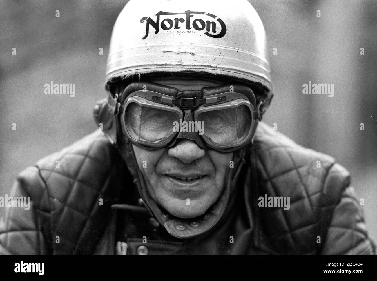 Old biker riding his 500cc Manx Norton motorcycle in 1994. British ...