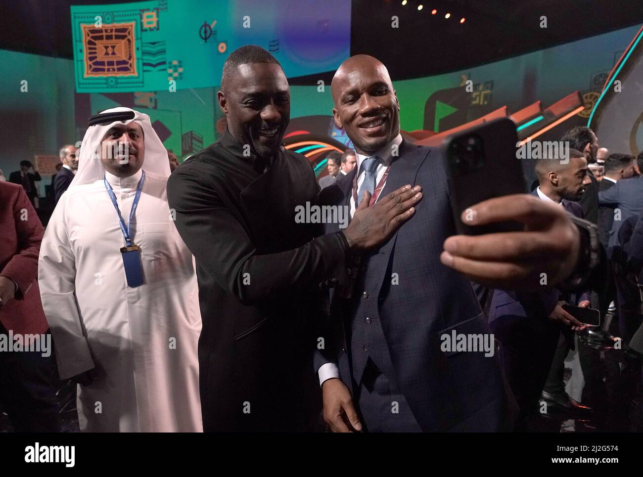Idris Elba and Didier Drogba (right) take a selfie during the FIFA ...