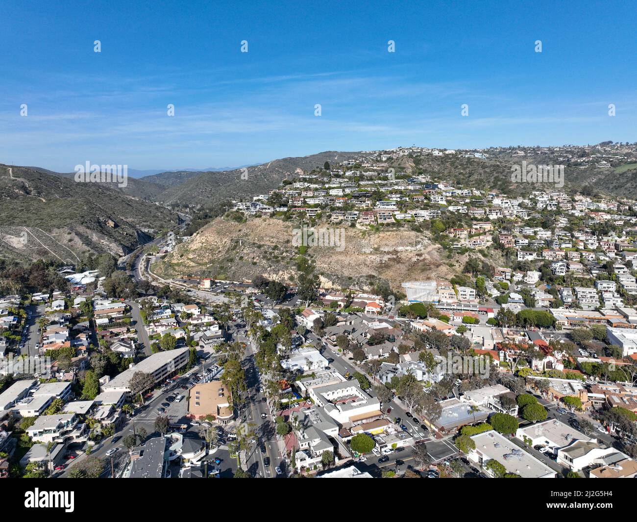 Aerial view of Laguna Beach coastline town with vilas on the hills ...