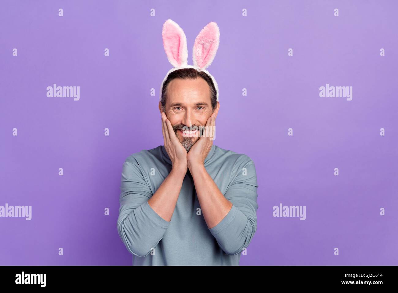 Portrait of satisfied person arms on cheeks toothy smile look camera ...