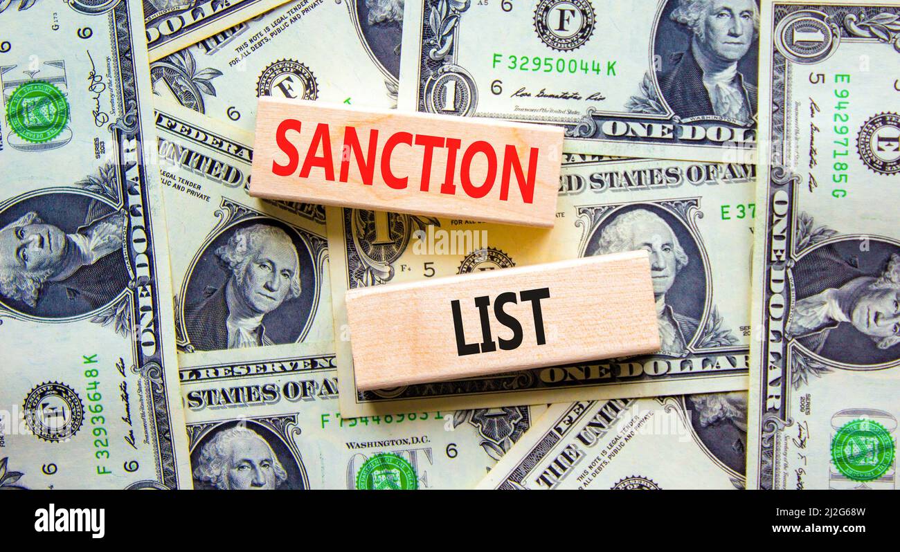 Sanction list symbol. Wooden blocks with concept words Sanction list on ...