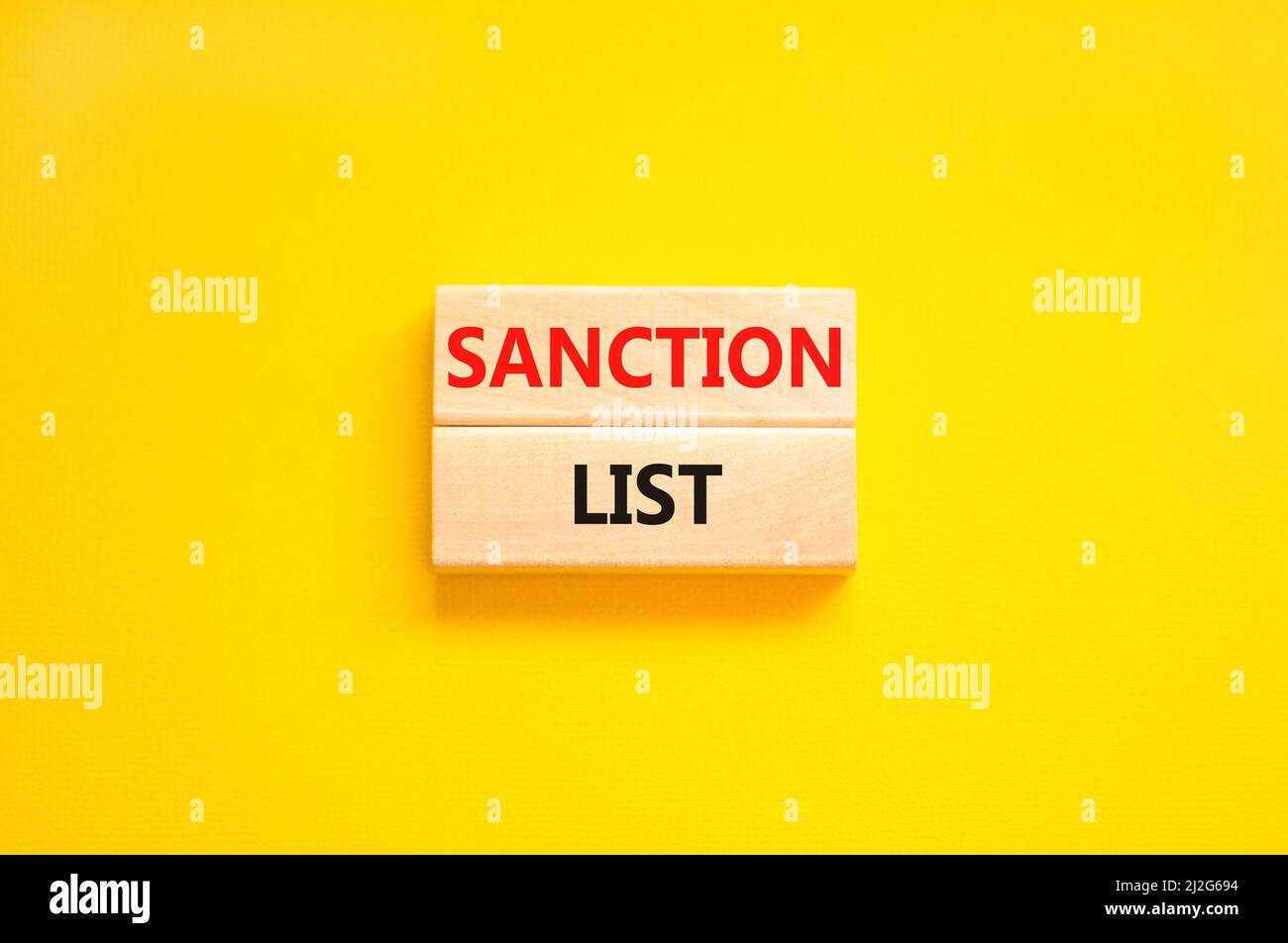 Sanction list symbol. Wooden blocks with concept words Sanction list on ...