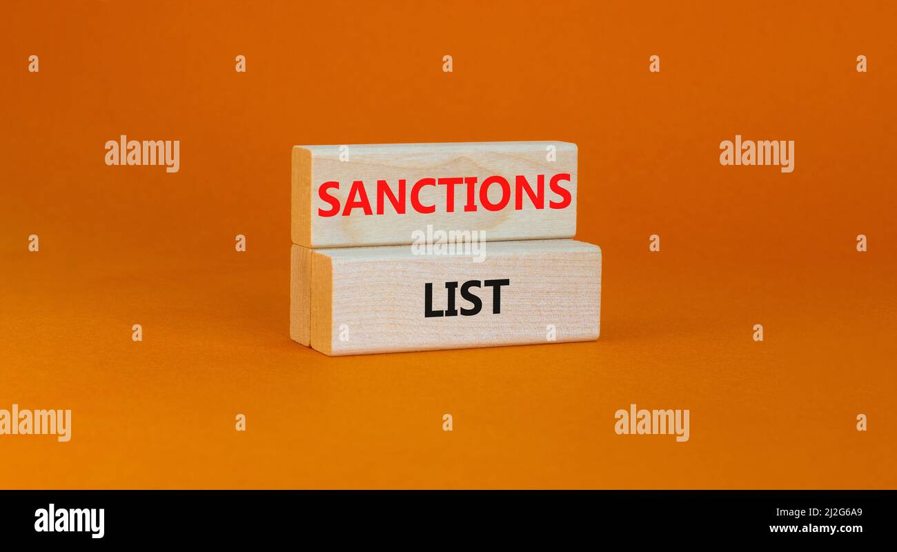 Sanctions list symbol. Wooden blocks with concept words Sanctions list ...