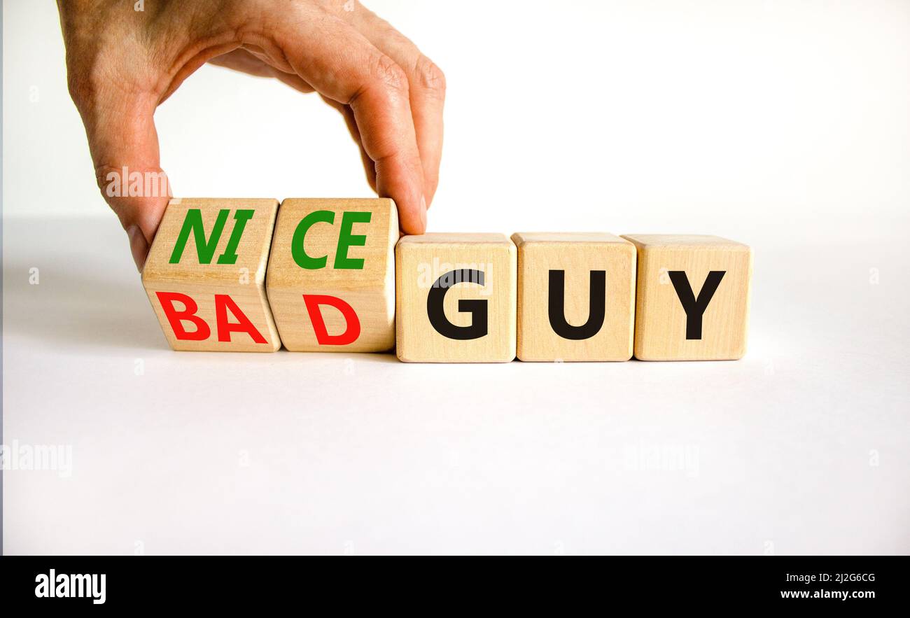 Nice or bad guy symbol. Businessman turns cubes and changes concept ...